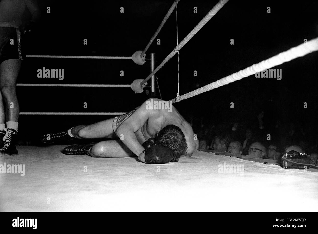 Johnny Prescott goes down in the last round Stock Photo - Alamy