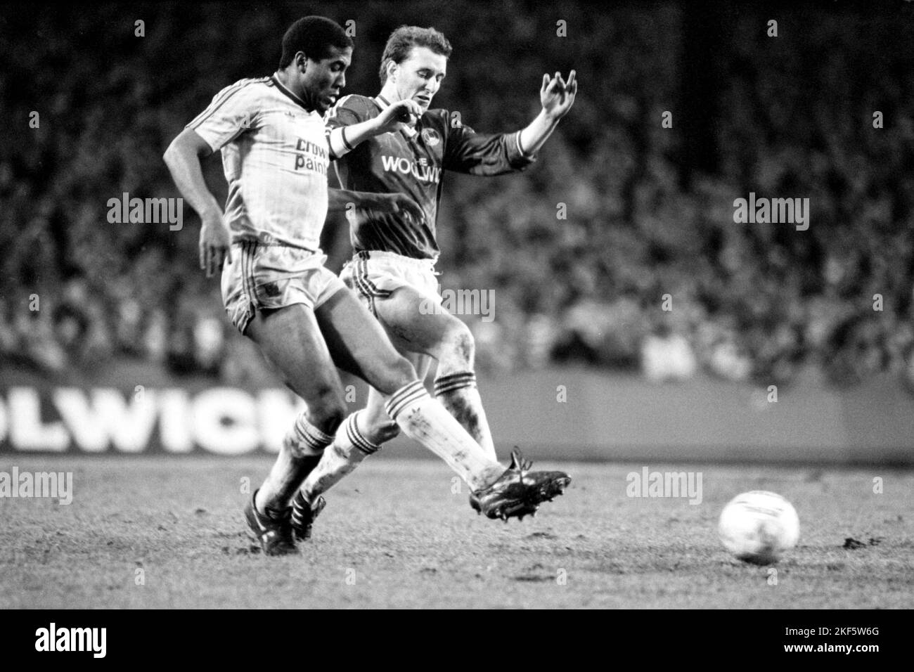(L-R) Liverpool's John Barnes beats Charlton Athletic's David Campbell ...