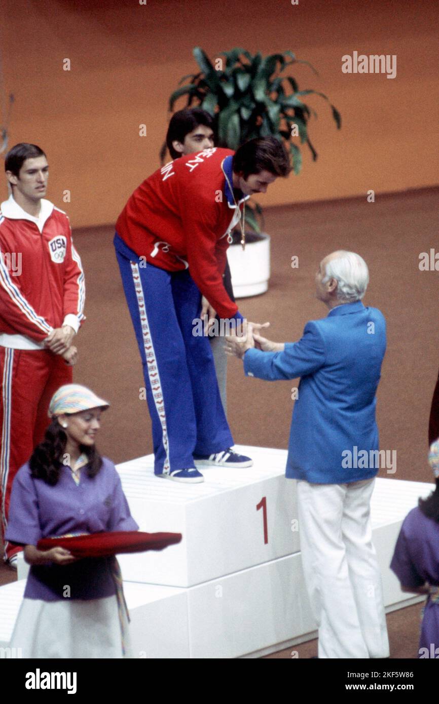 Great Britain's David Wilkie is presented with his gold medal as the ...