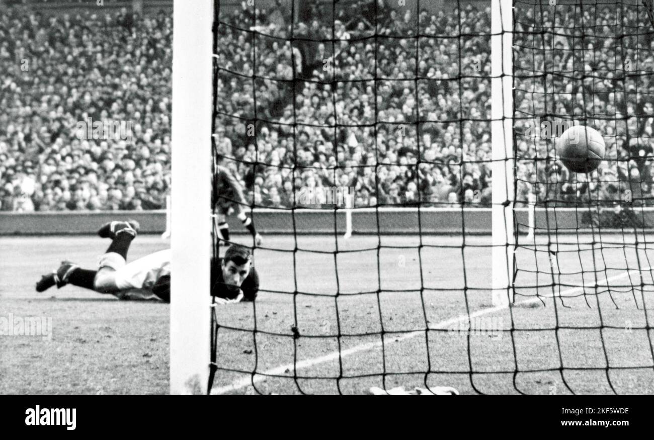 Blackpool goalkeeper George Farm is beaten by Newcastle United's second ...