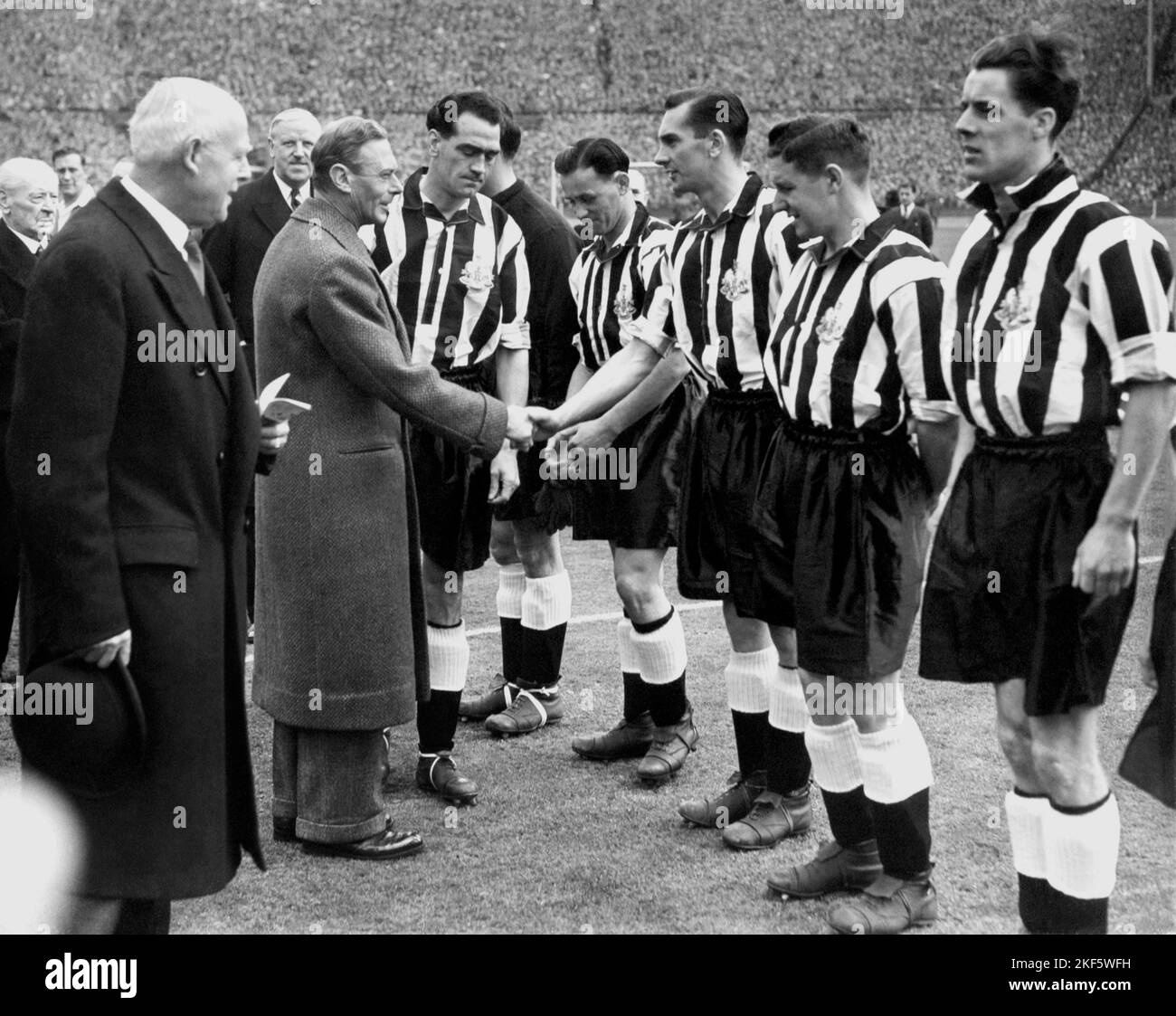Newcastle United captain Joe Harvey (fourth l) introduces HRH King ...