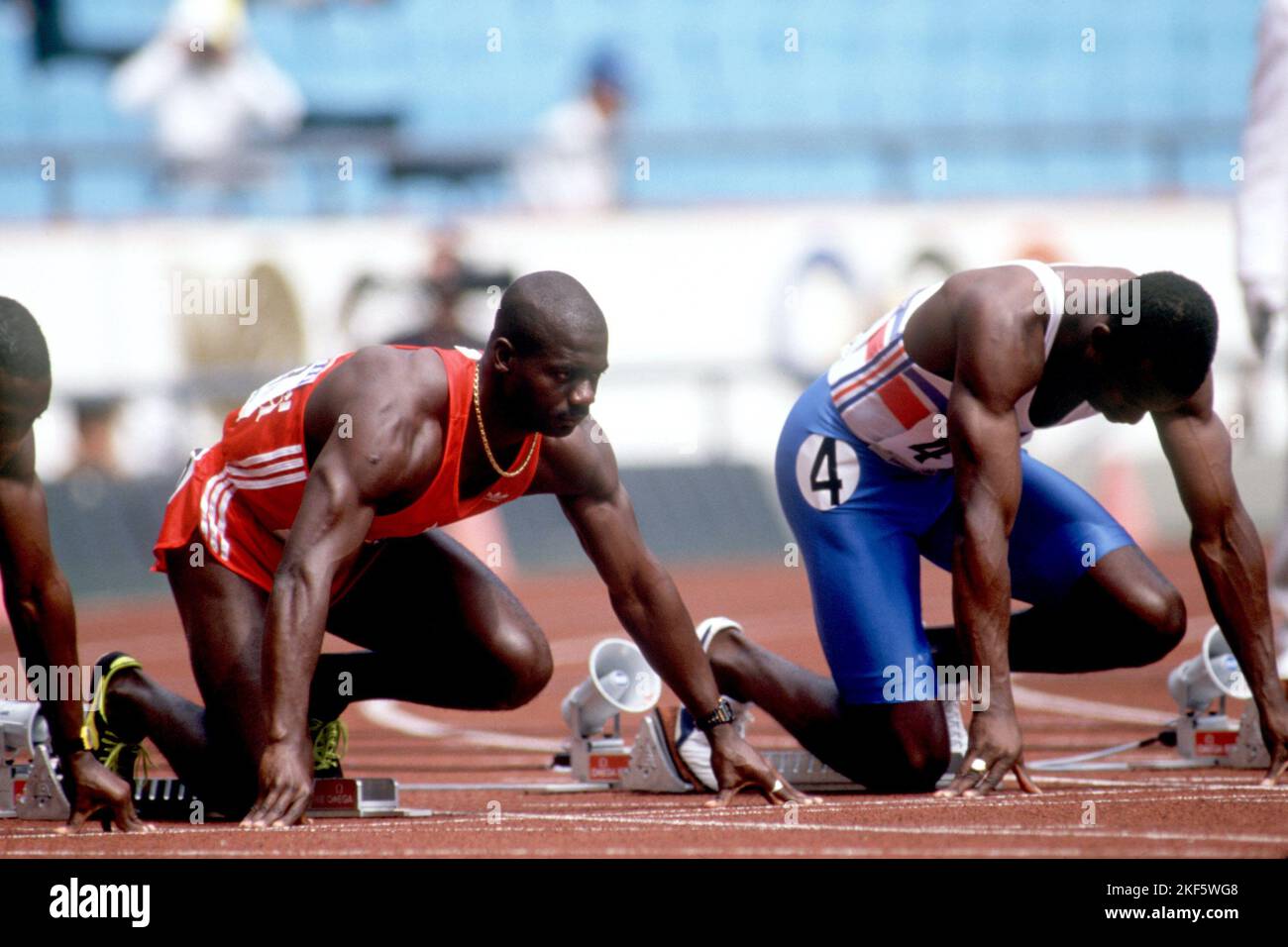 (L-R) Canada's Ben Johnson lines up alongside Great Britain's Linford ...