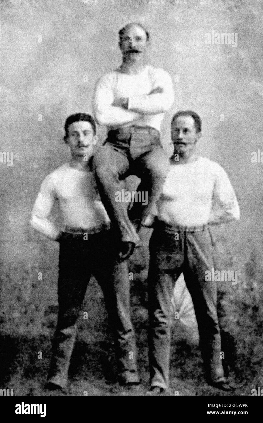 Germany's Carl Schuhmann (c), gold medallist in the wrestling and horse ...