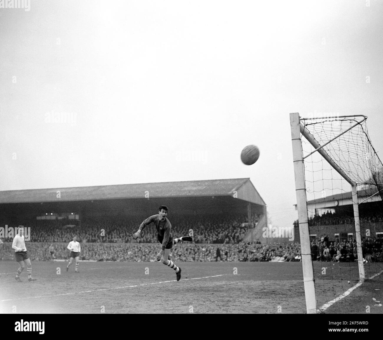 Preston North End goalkeeper Alan Kelly makes a flying save Stock Photo ...