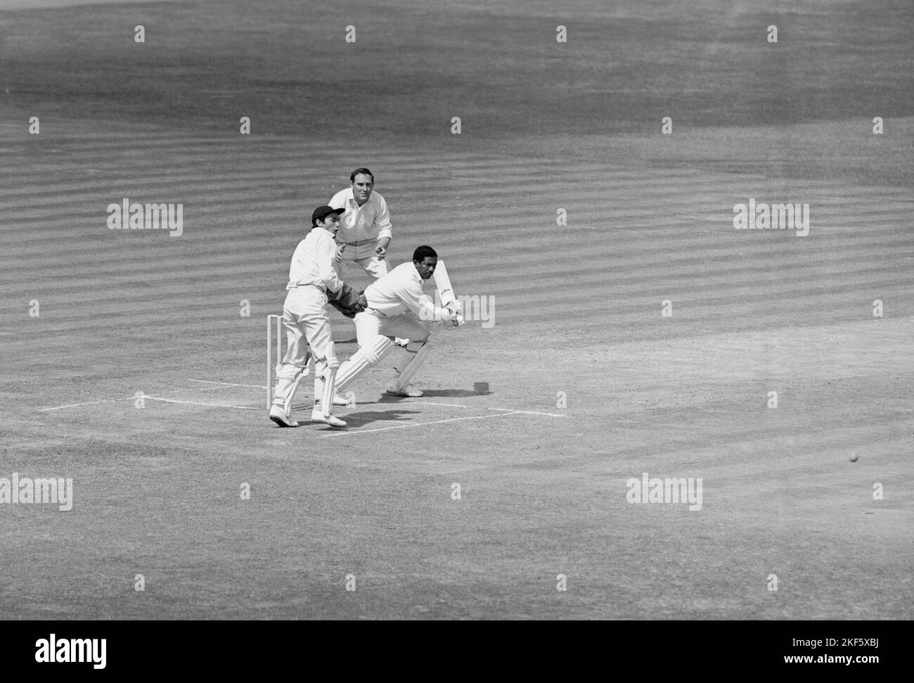 Basil Butcher (West Indies) cuts Basil D'Oliviera Stock Photo - Alamy