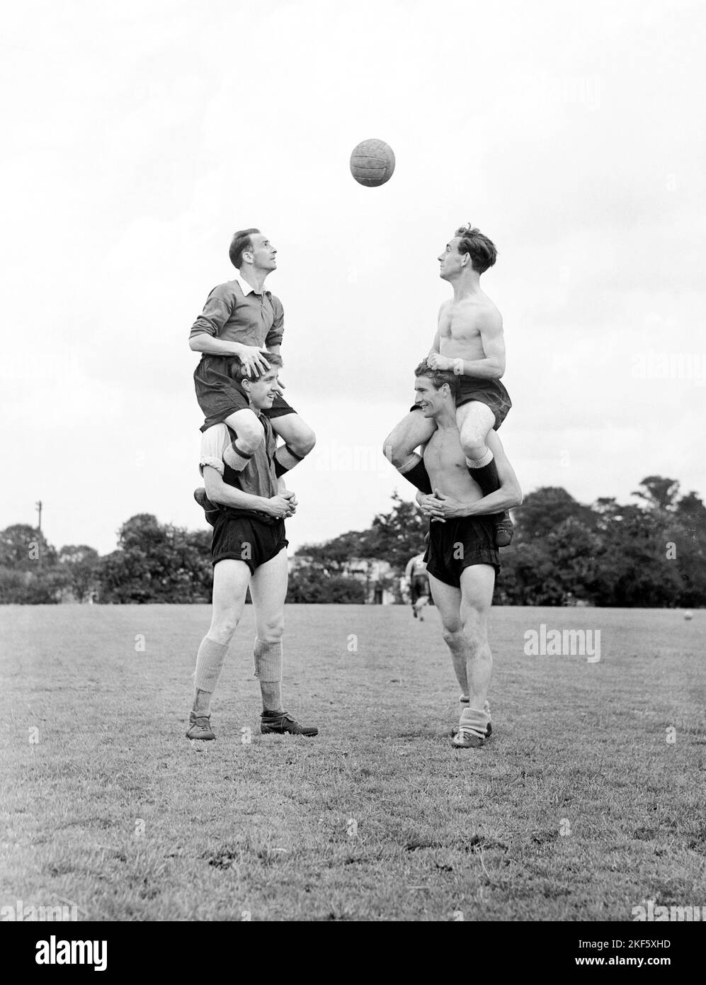West Ham United's John Bond (bottom l) and Malcolm Allison (bottom r ...