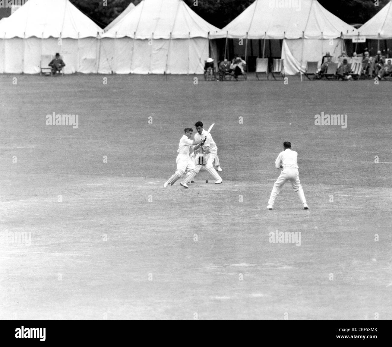 Kent's Tony Pawson (l) mistimes a pull, watched by Middlesex ...