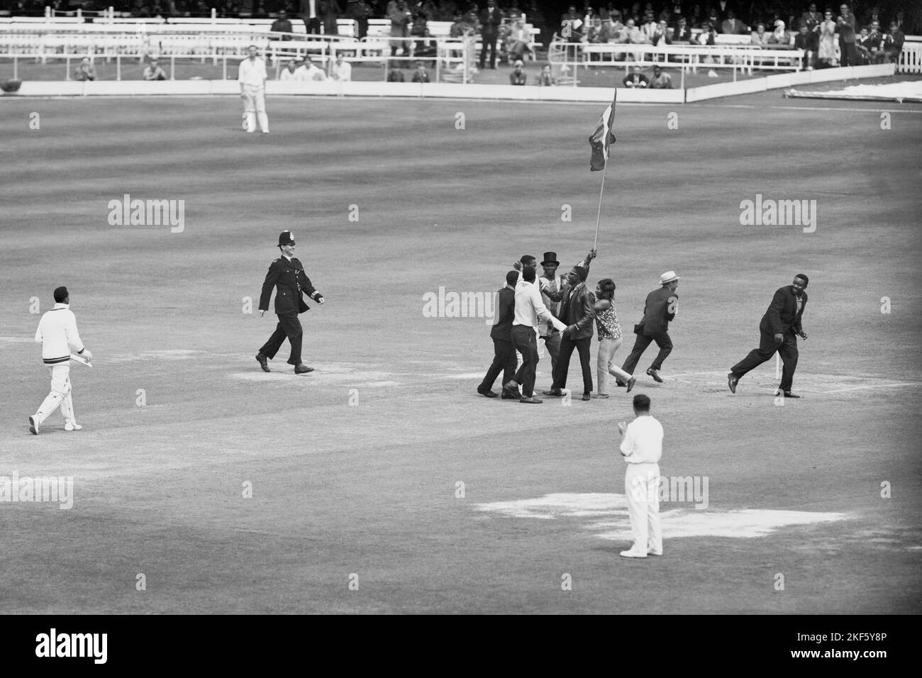 West Indies fans congratulate David Holford on reaching his century ...