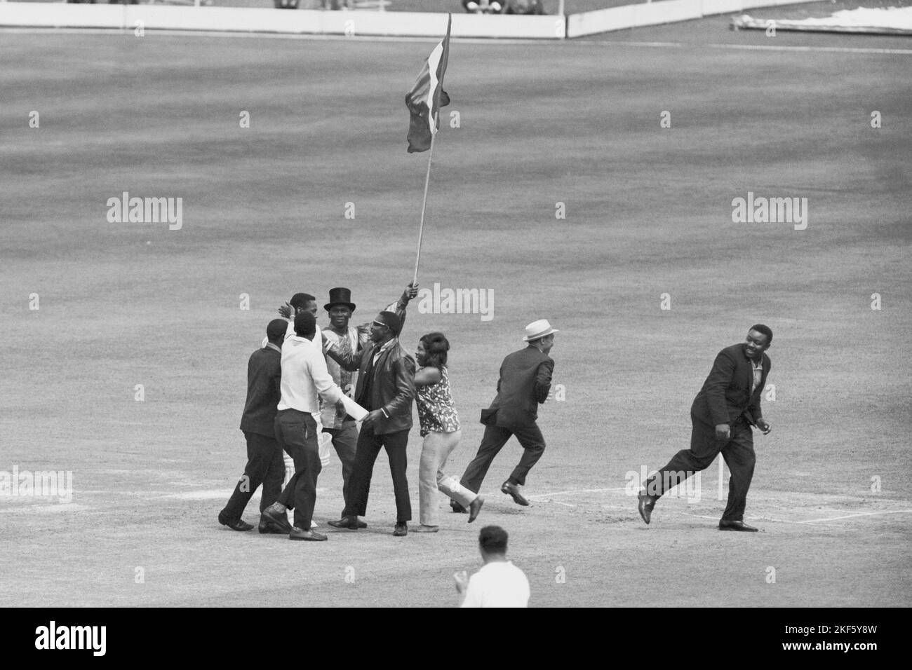 West Indies fans congratulate David Holford on reaching his century ...