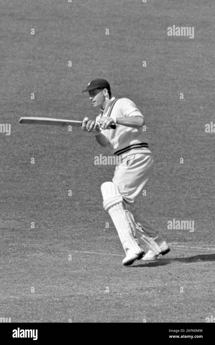Sir Derrick Bailey, Gloucestershire captain, driving a ball from Alan ...