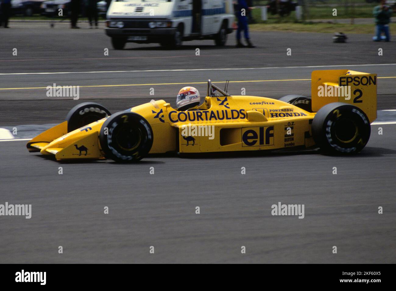 Satoru Nakajima aboard the Lotus 100T during practice for the British Grand Prix at Silverstone ...