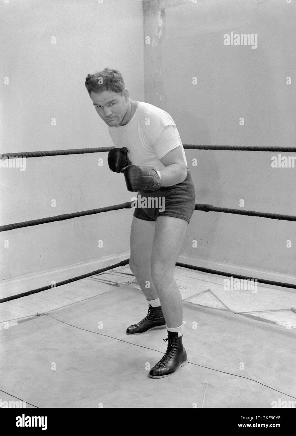 Red Burman, American heavyweight boxer, training for his fight with ...