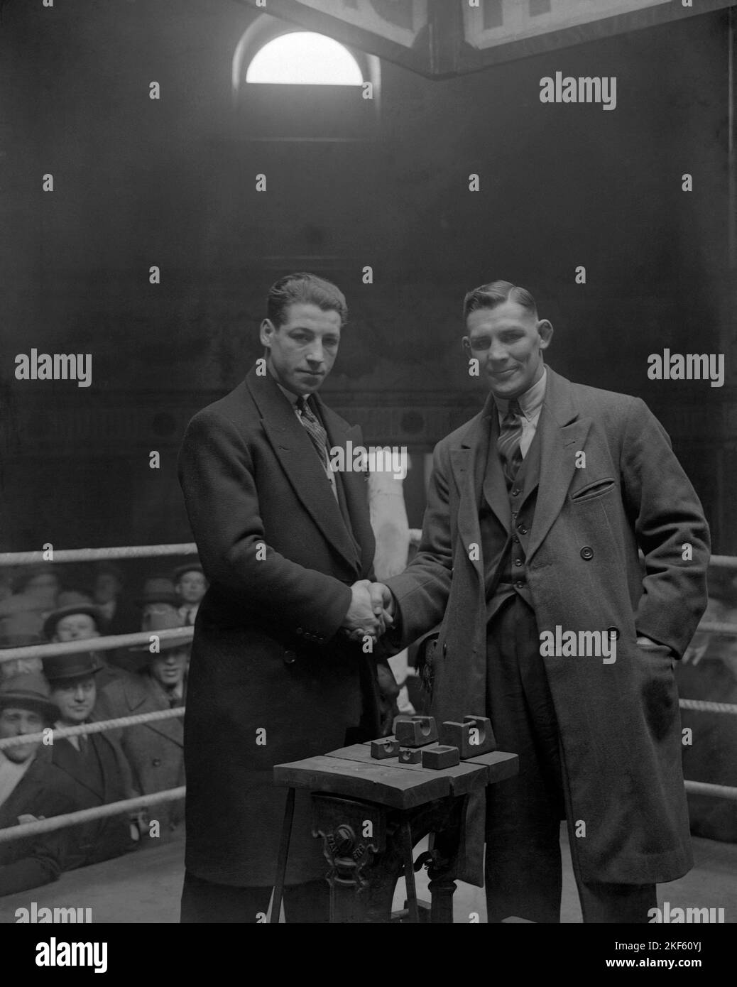 British light heavyweight boxer Len Harvey, left, shakes hands with ...