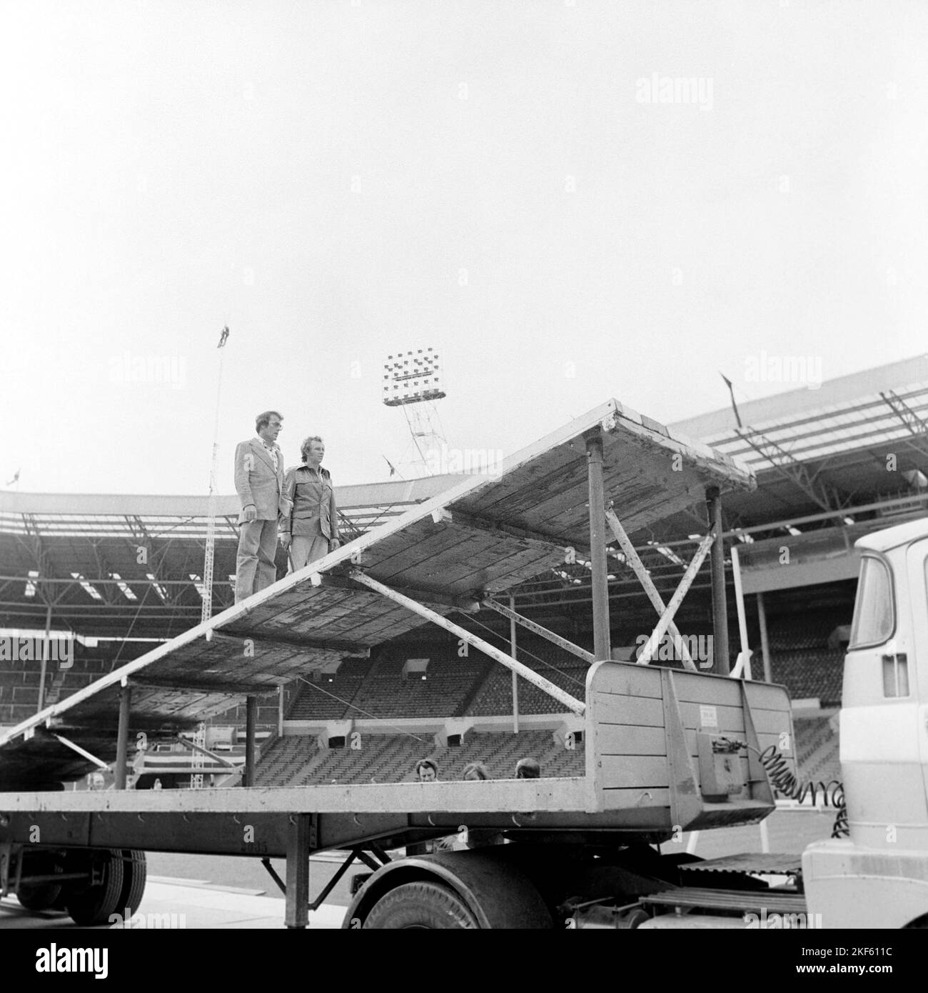 Stunt rider Evel Knievel, right, checking the ramp before his attempt ...