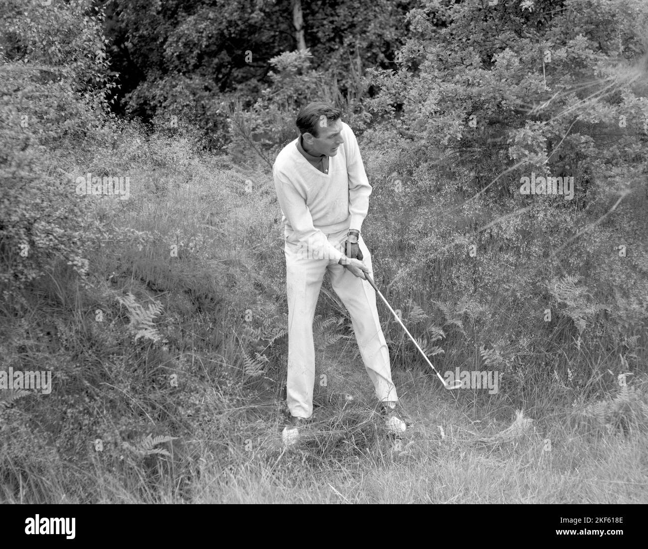 Comedian and television personality Eric Sykes plays out of the rough ...