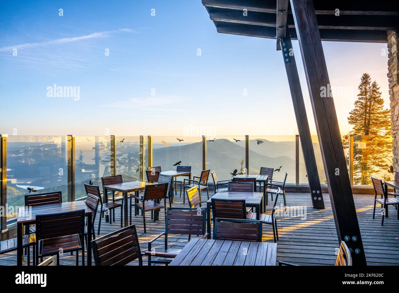 Terrace of mountain restaurant at sunset time Stock Photo - Alamy