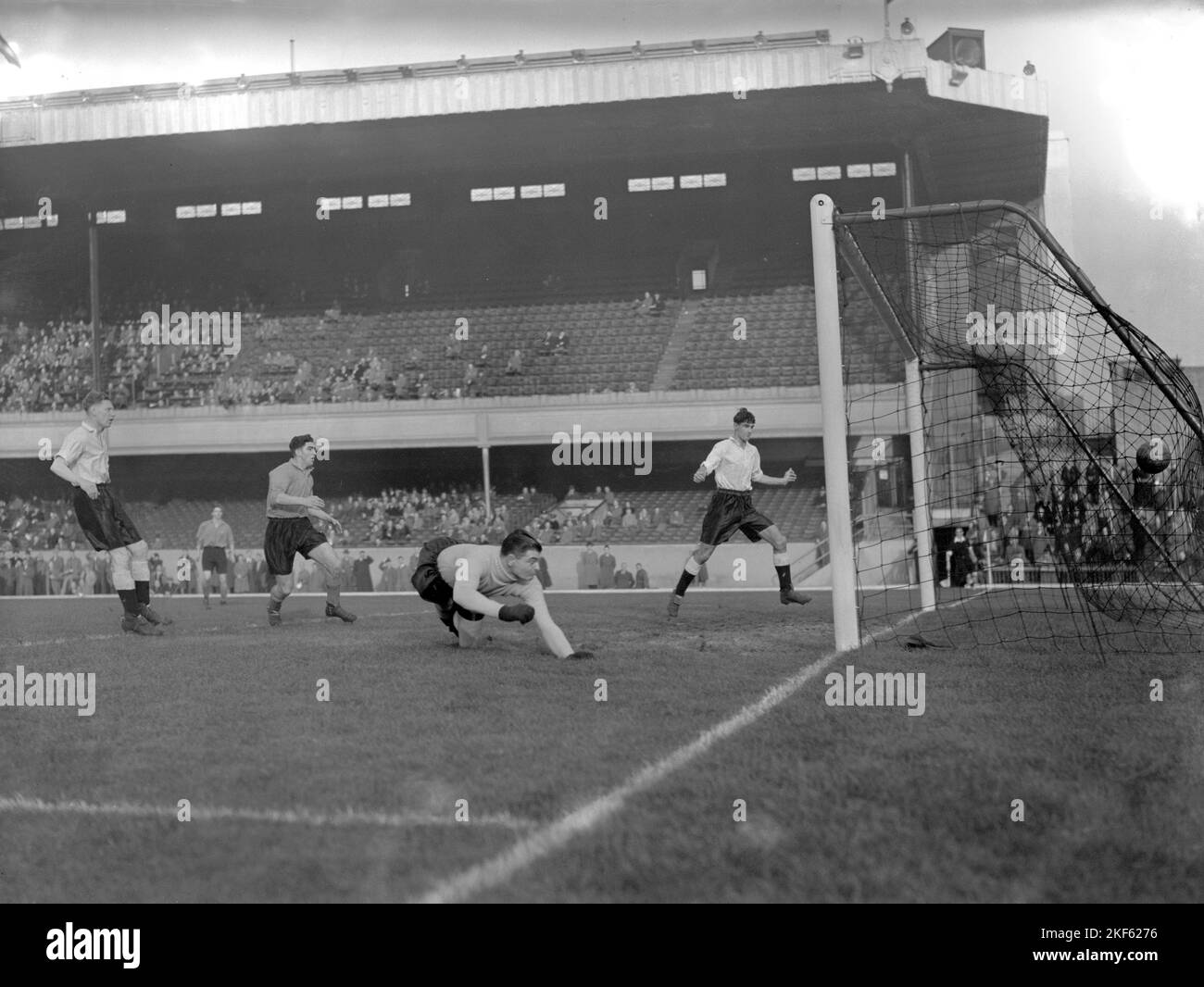 T. Taylor, of the Army, scores his second goal, as Charlie Ashcroft ...