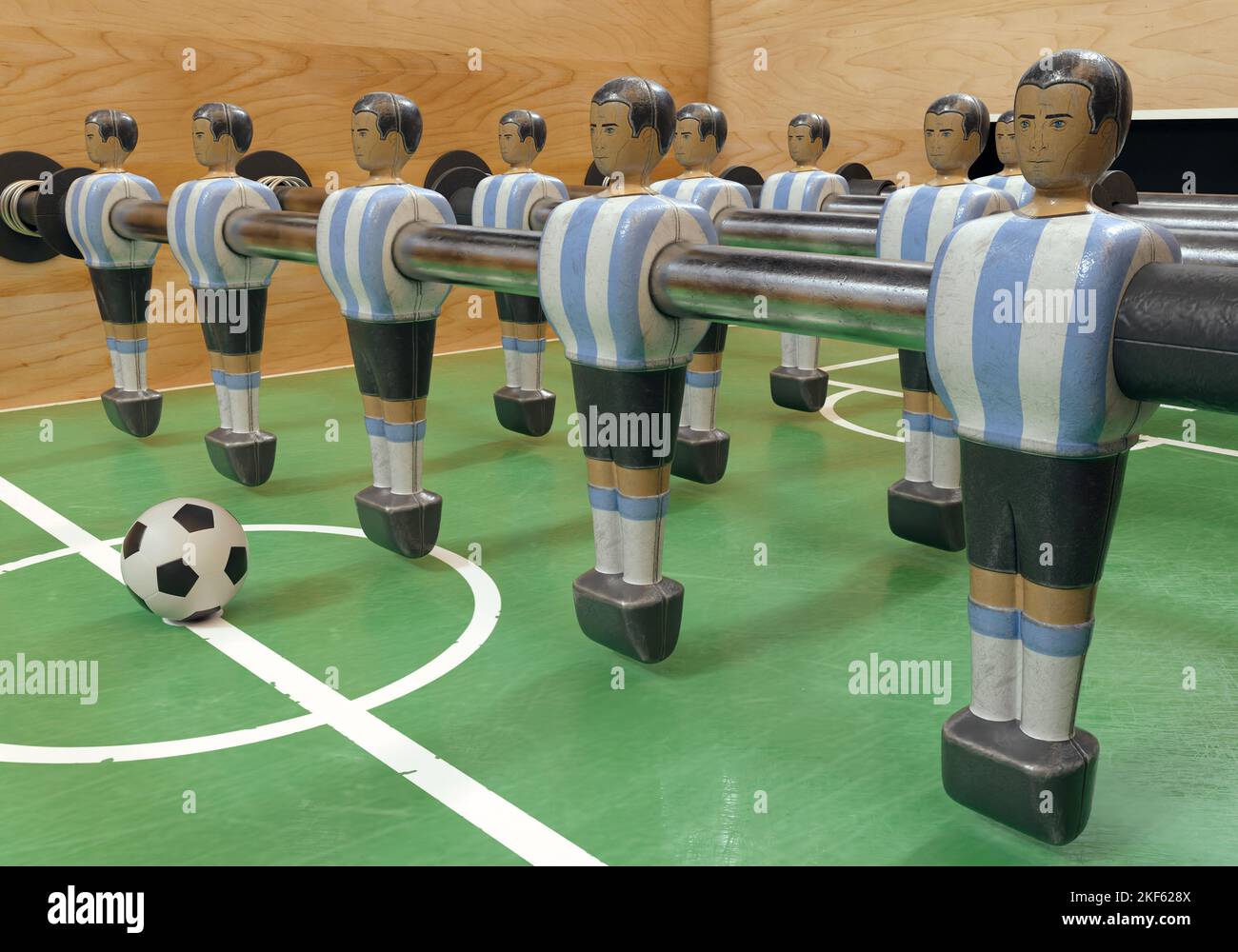 One side of a vintage foosball or table football table with worn metal ...