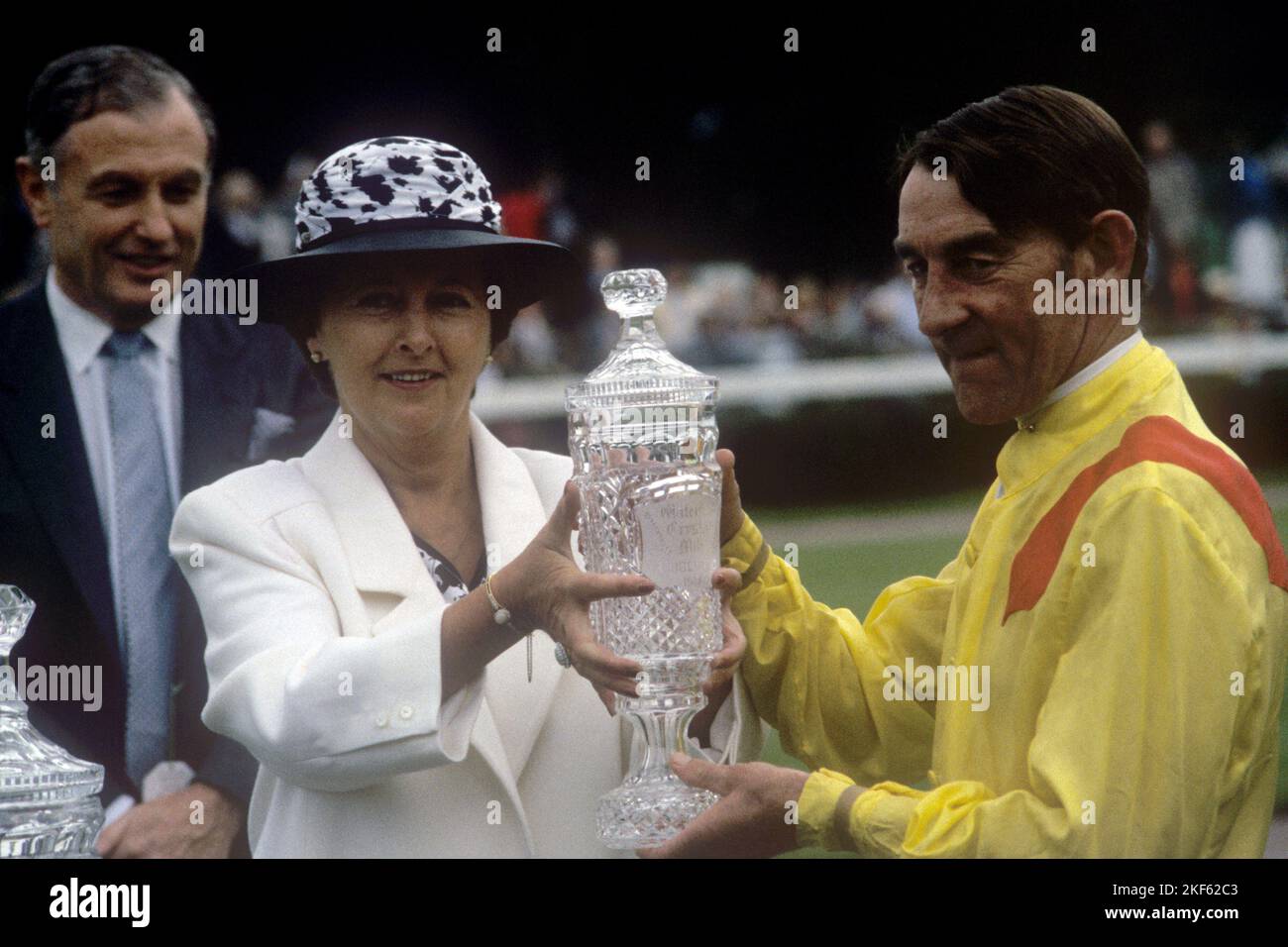 Jockey Greville Starkey receives the Waterford Crystal Mile Trophy from ...