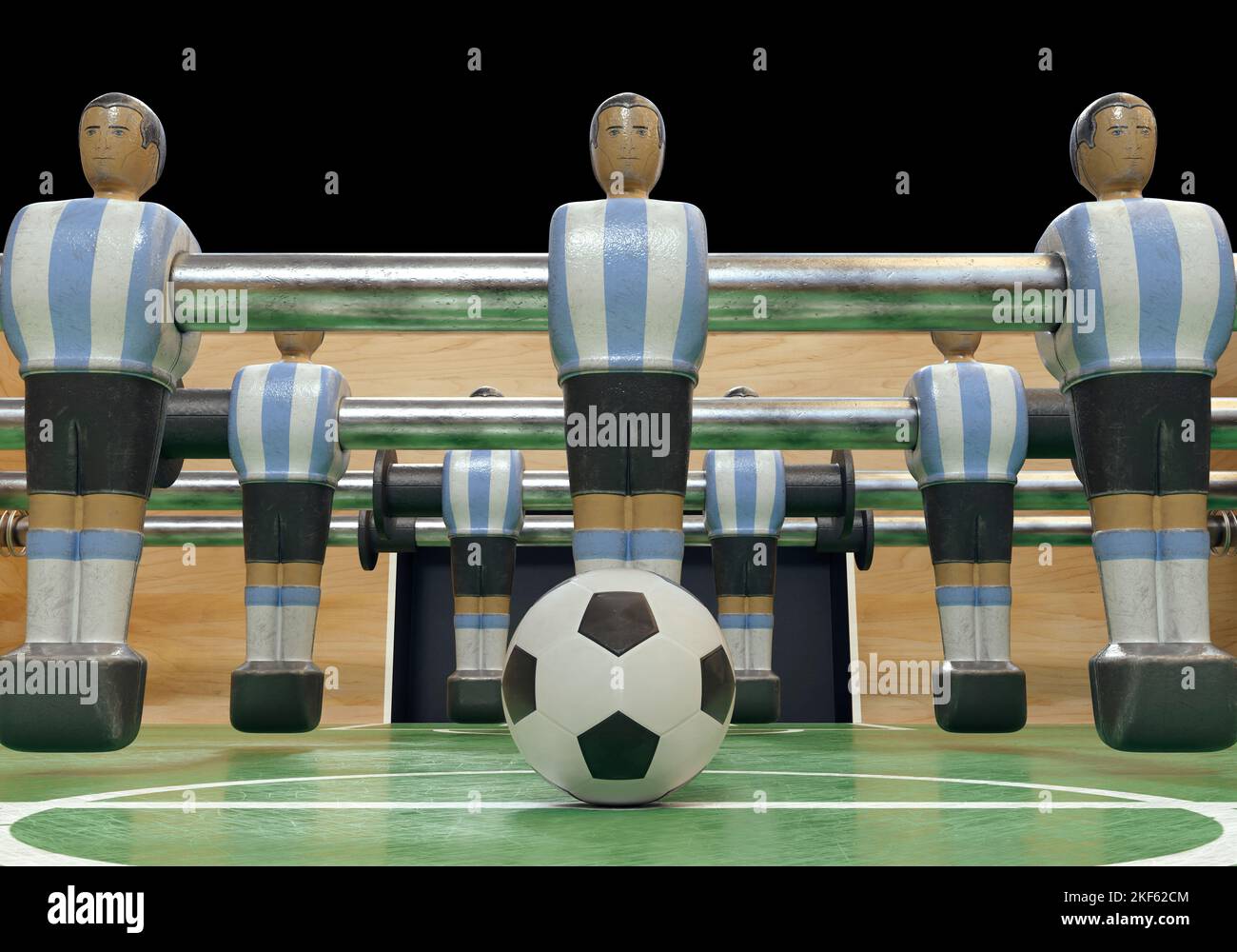 One side of a vintage foosball or table football table with worn metal ...