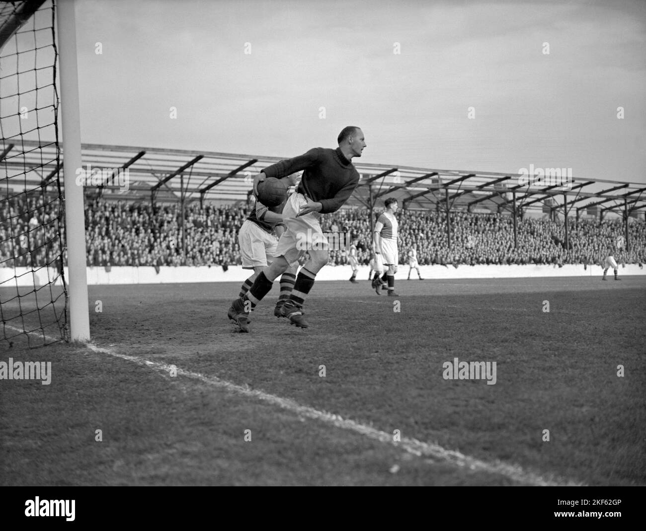 Alfred Wood, the Coventry goalkeeper clears his goal Stock Photo - Alamy