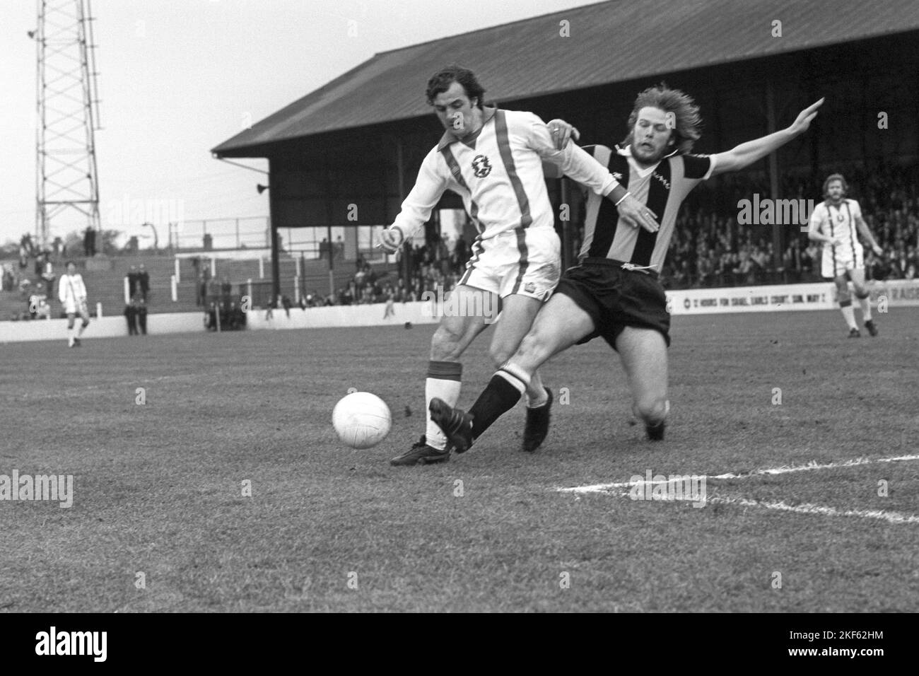 Derek Clarke, left, pushes off a challenge from Stuart Croft, Hull City ...