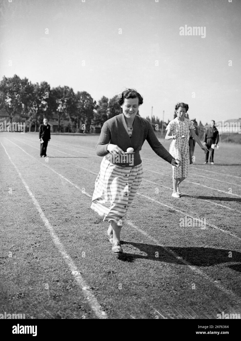 General view of the egg and spoon race Stock Photo - Alamy