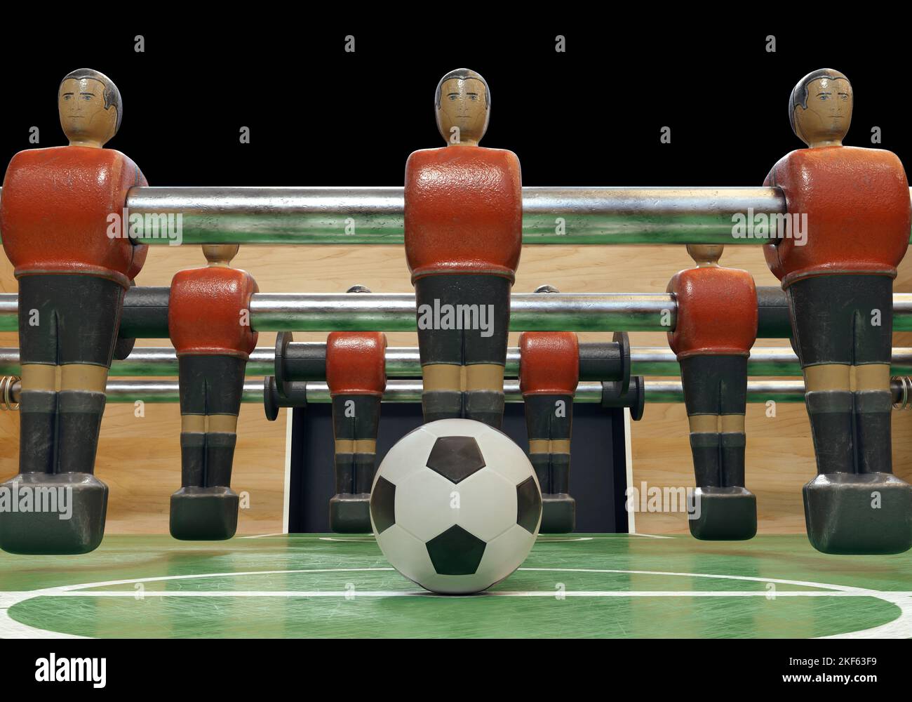One side of a vintage foosball or table football table with worn metal ...