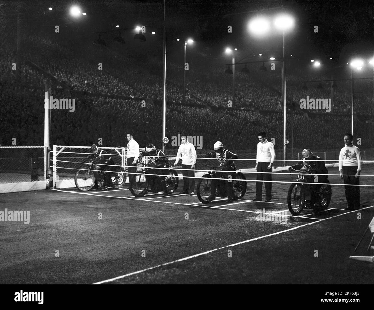 The start of the first heat, left to right, Cliff Watson, Ron Charles ...