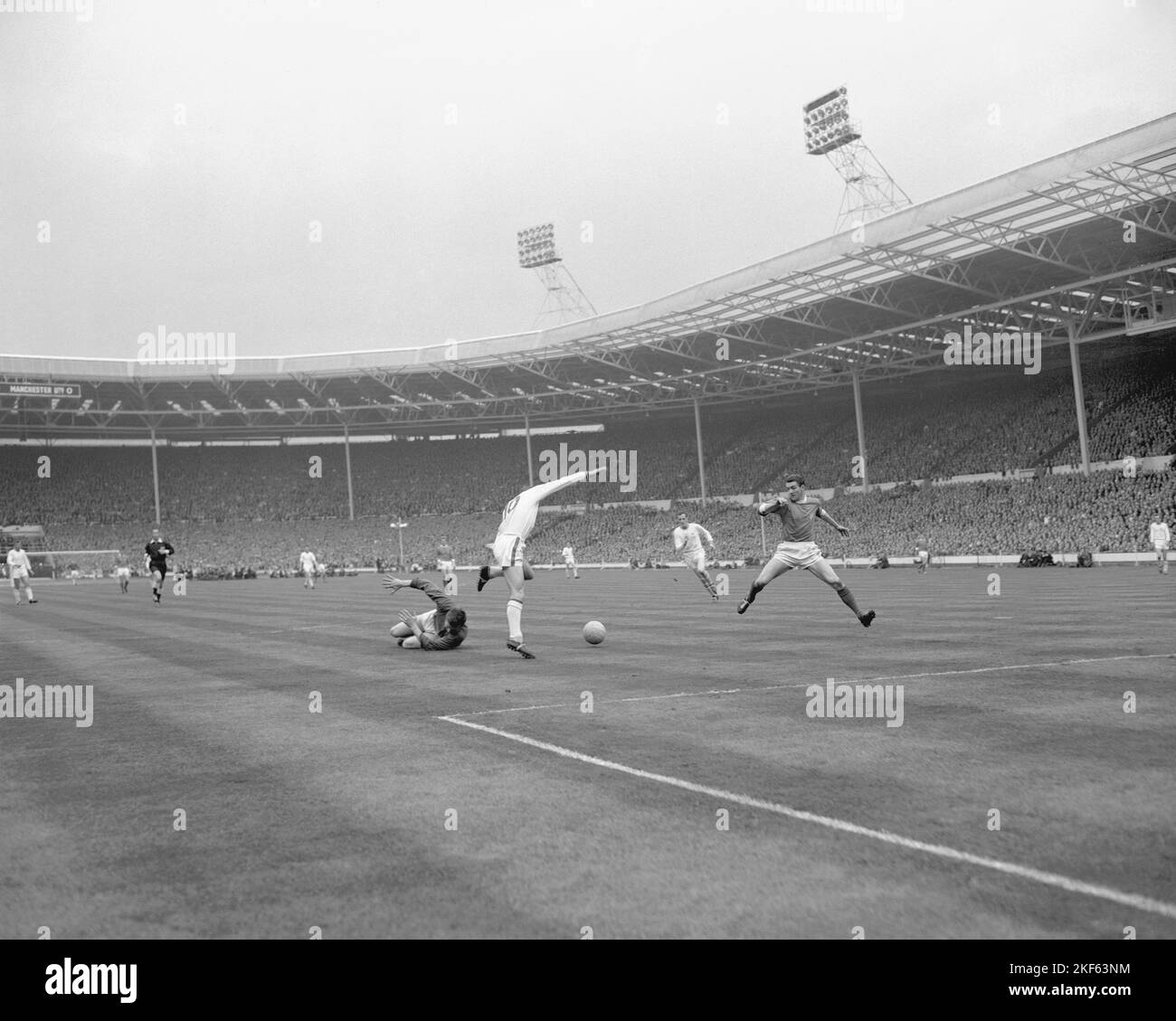 Manchester United goalkeeper David Gaskell makes a desperate save at ...