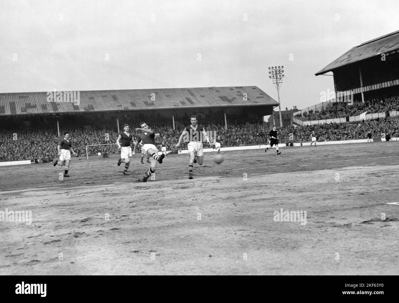R.Bentley the Chelsea center forward takes a shot at the Burnley goal ...