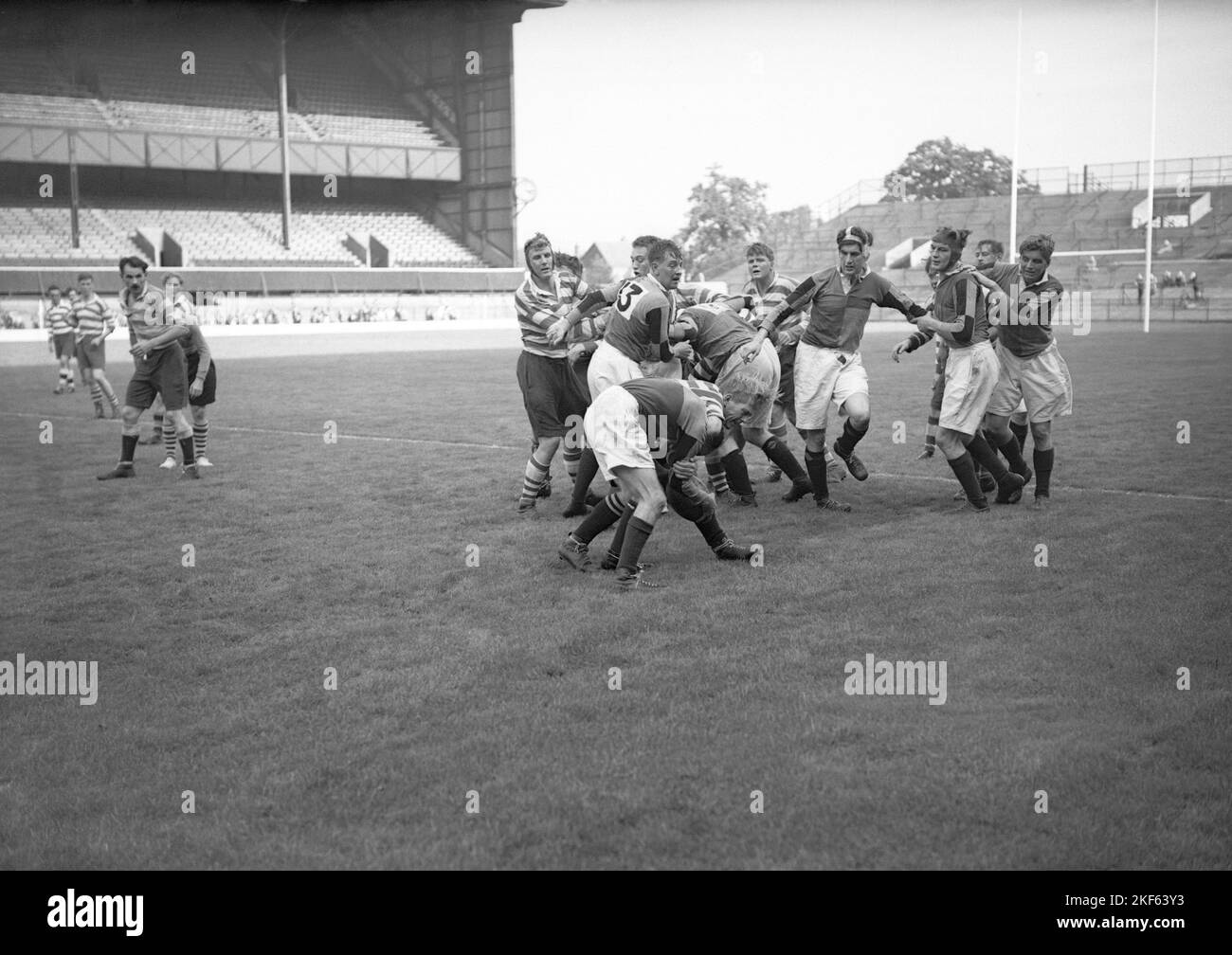 Ole Kverndal (Rosslyn Park) brings down H De Lacey (Harlequins) on the ...