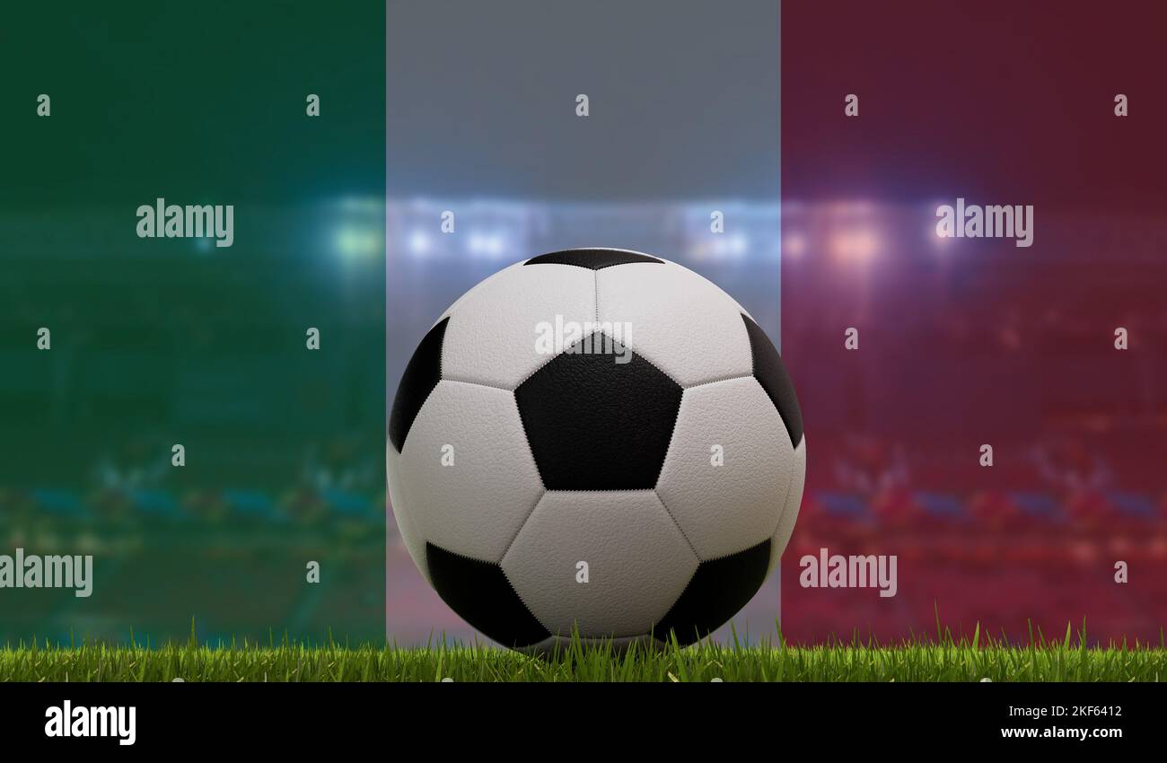 Soccer football ball on a grass pitch in front of stadium lights and ...