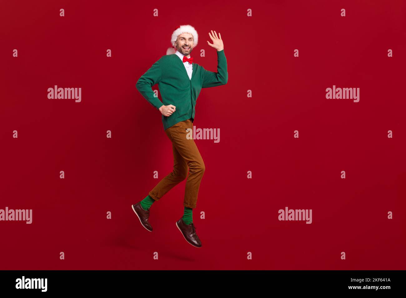 Full body size photo of funny energetic guy wear christmas mood clothes ...