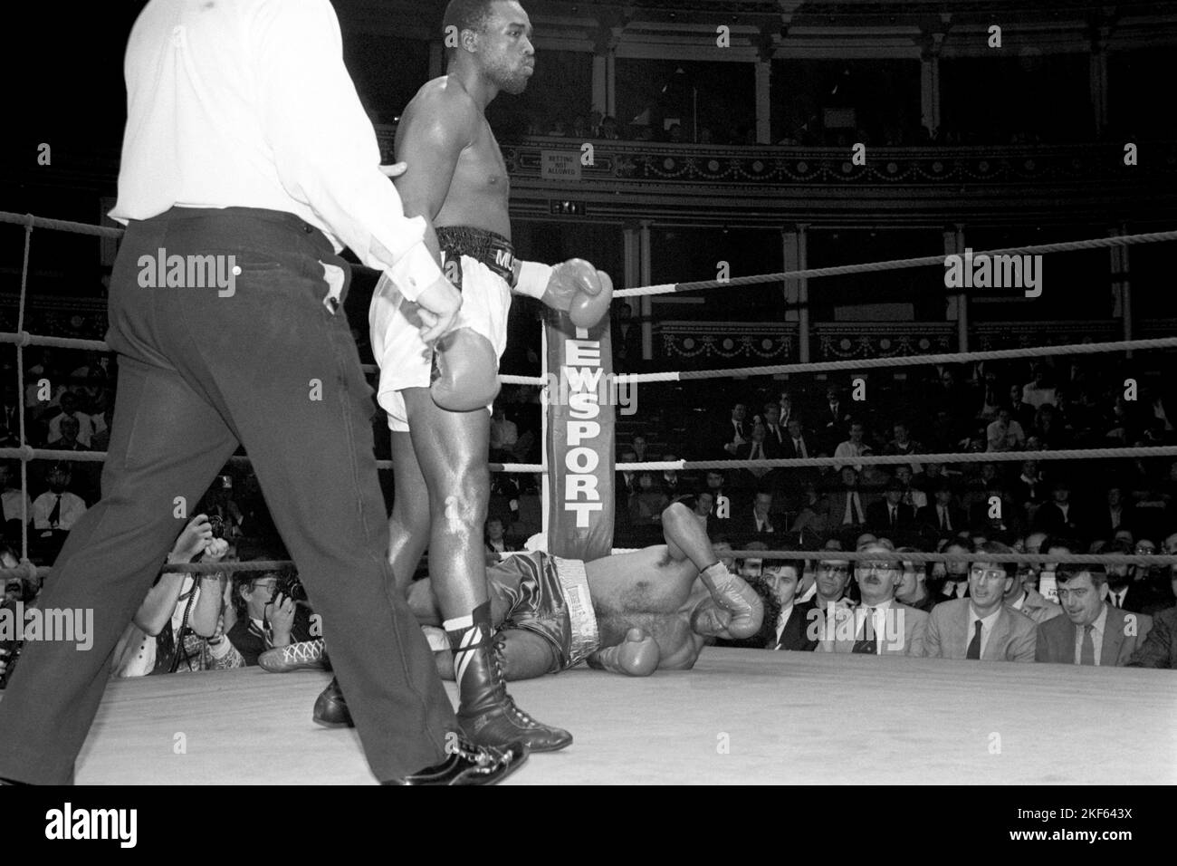 Ugandan boxer John "The Beast" Mugabi is sent to his corner after ...