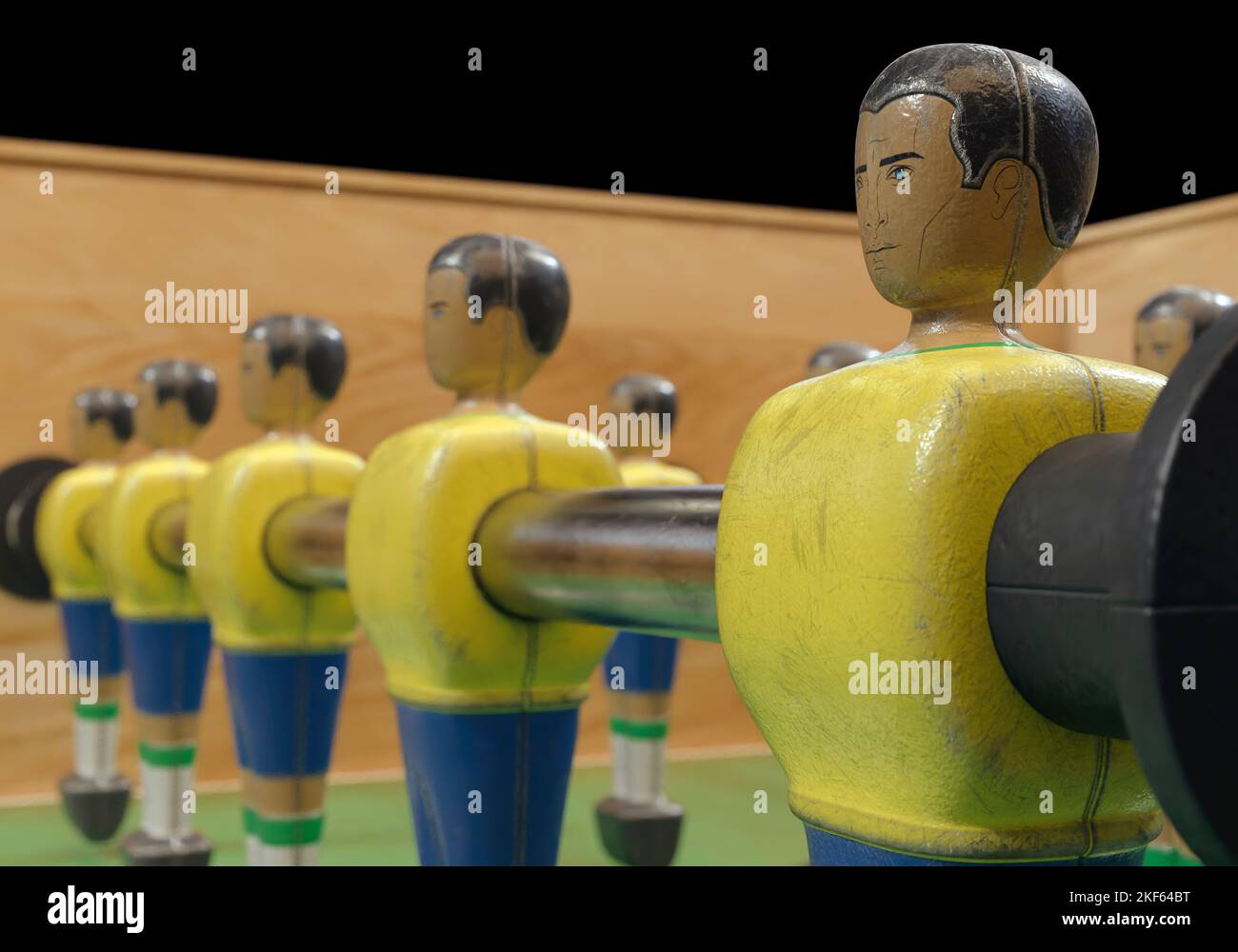 One side of a vintage foosball or table football table with worn metal ...