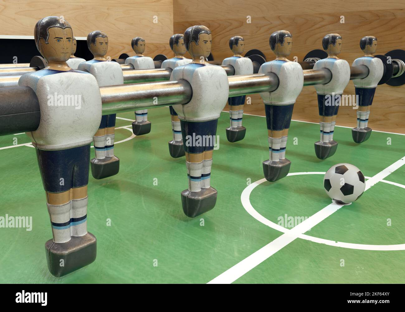 One side of a vintage foosball or table football table with worn metal ...