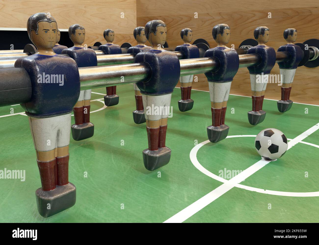 One side of a vintage foosball or table football table with worn metal ...