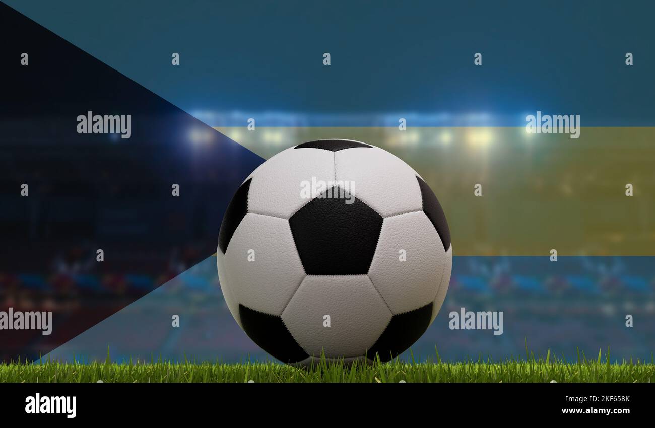 Soccer football ball on a grass pitch in front of stadium lights and ...