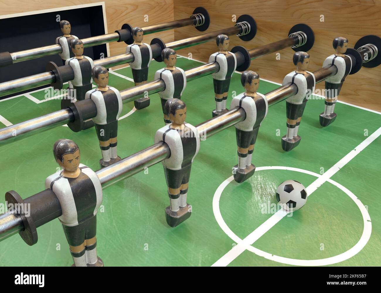 One side of a vintage foosball or table football table with worn metal ...