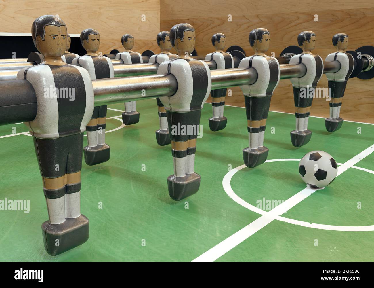 One side of a vintage foosball or table football table with worn metal ...