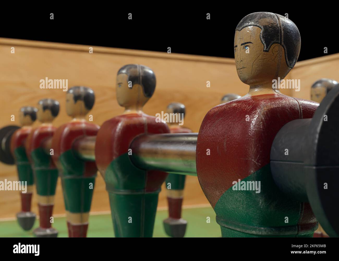 One side of a vintage foosball or table football table with worn metal ...