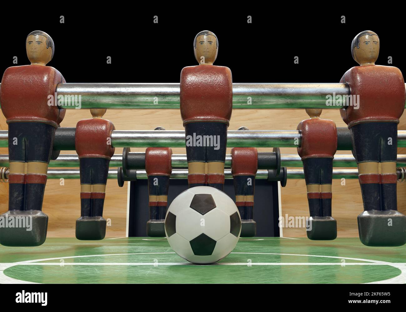 One side of a vintage foosball or table football table with worn metal ...