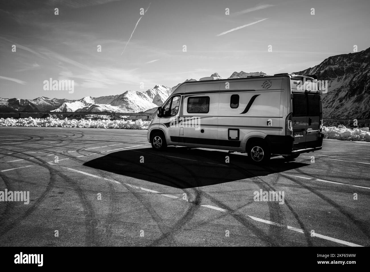panoramic view of camper van against snowcapped mountain in Austria ...