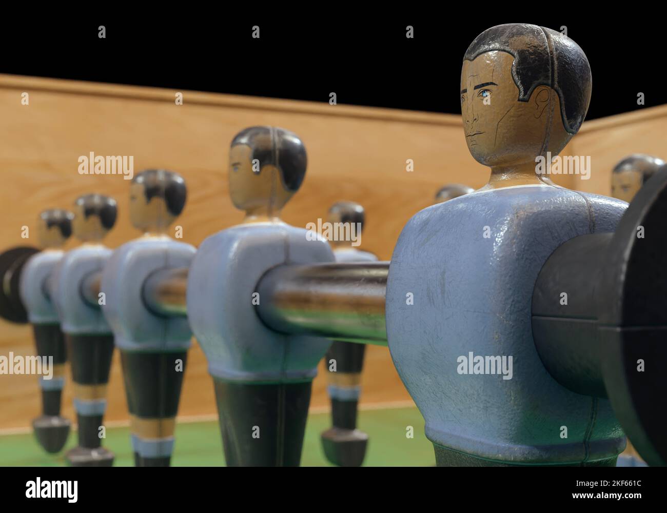 One side of a vintage foosball or table football table with worn metal ...