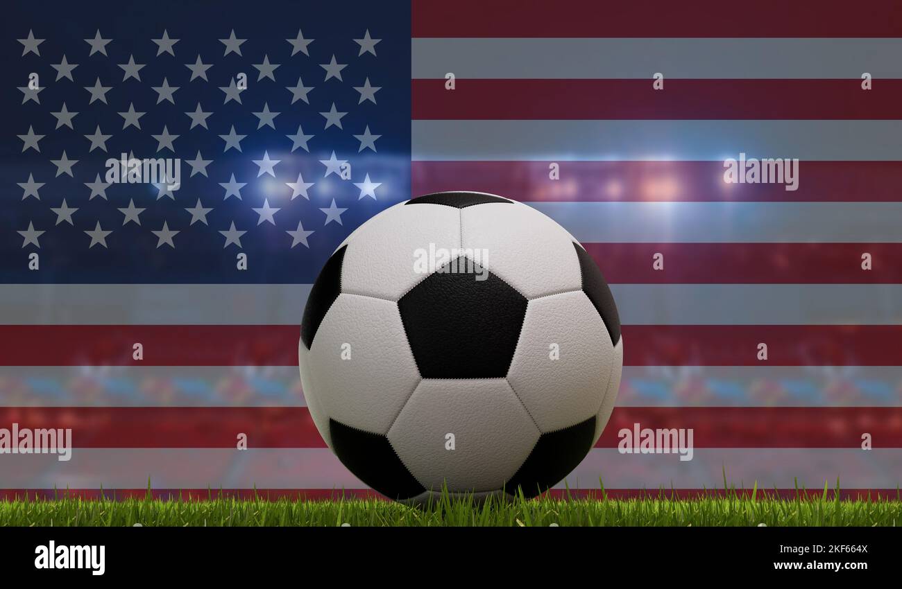 Soccer football ball on a grass pitch in front of stadium lights and ...