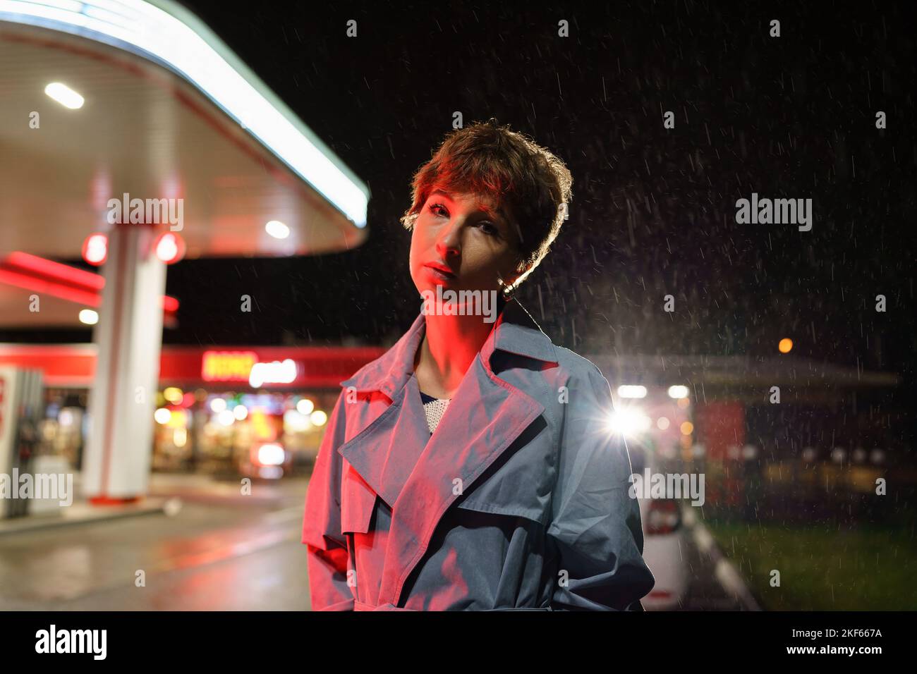 Gas station night woman hi-res stock photography and images - Alamy