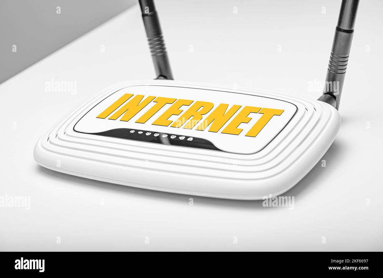 White Wi-Fi router for connecting devices to the Internet Stock Photo ...