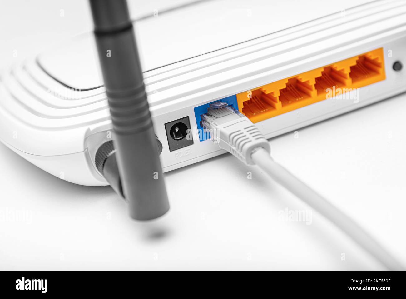 White Wi-Fi router for connecting devices to the Internet Stock Photo ...