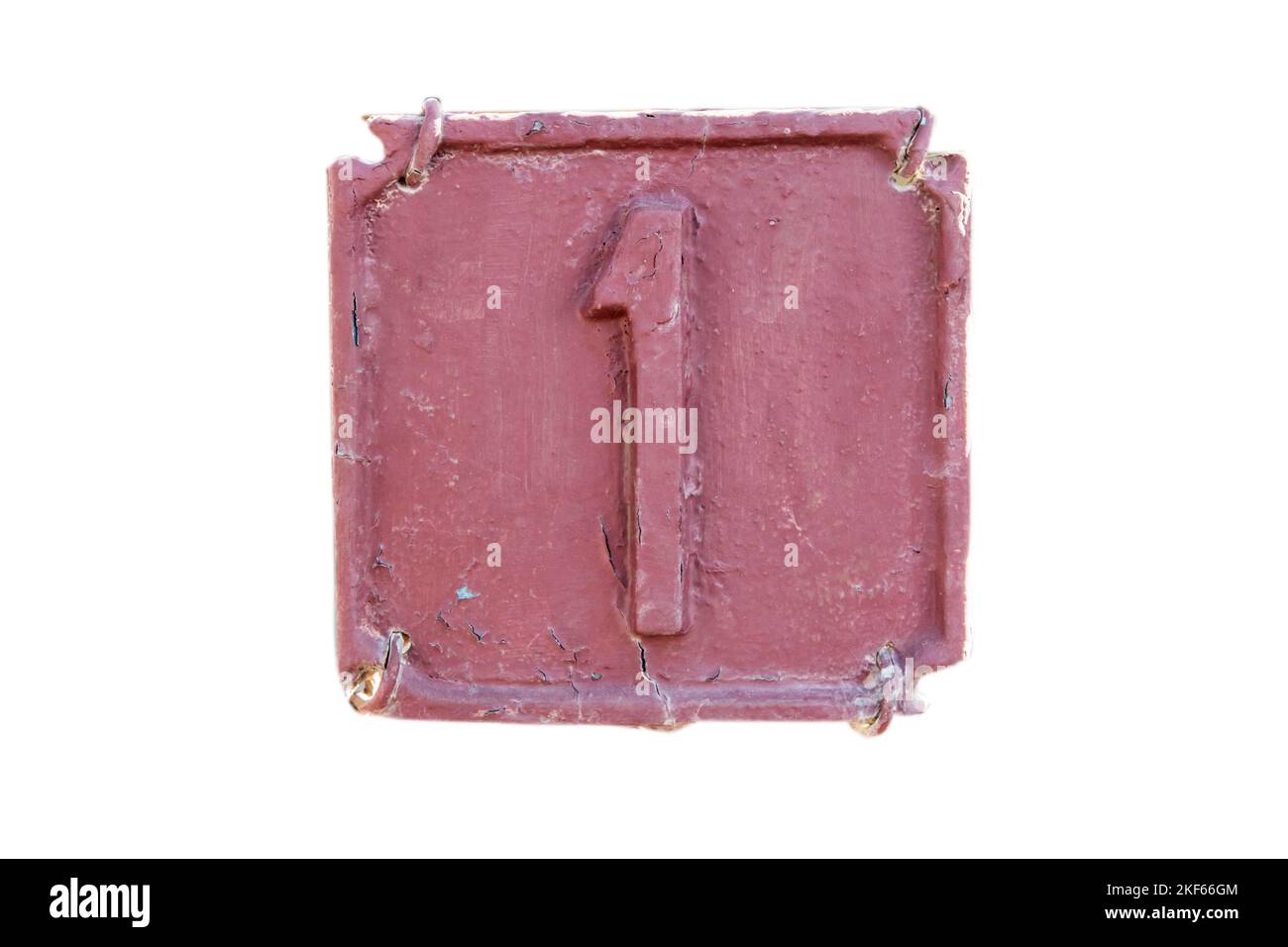 Old retro weathered cast iron plate with number 1 closeup isolated on ...